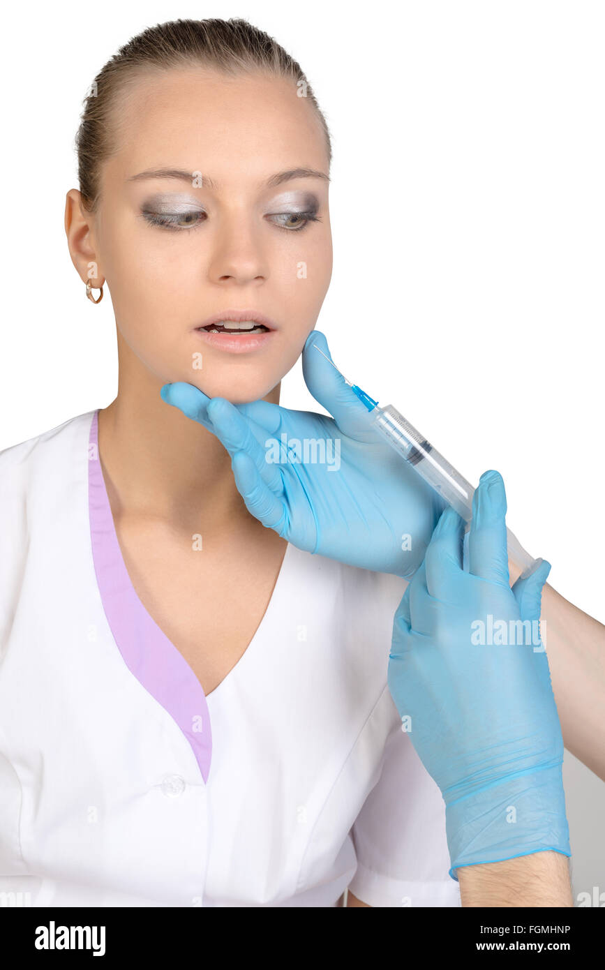 Young beautiful girl getting Botox injection from a syringe Stock Photo ...