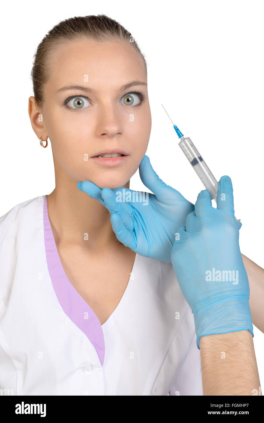 Young beautiful girl getting Botox injection from a syringe Stock Photo ...