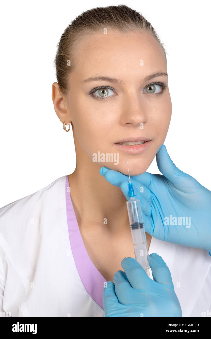Young beautiful girl getting Botox injection from a syringe Stock Photo ...