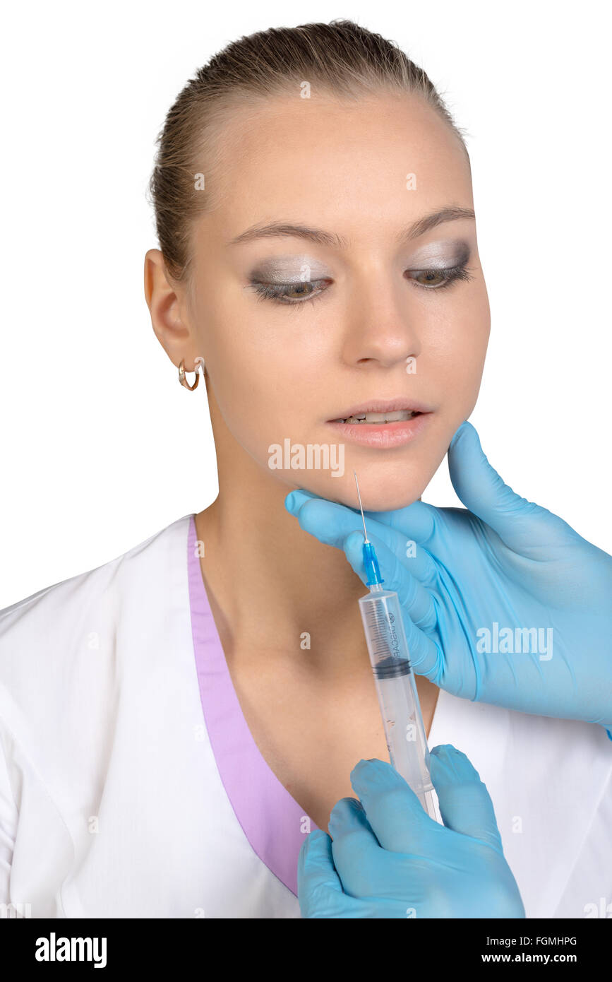 Young beautiful girl getting Botox injection from a syringe Stock Photo ...