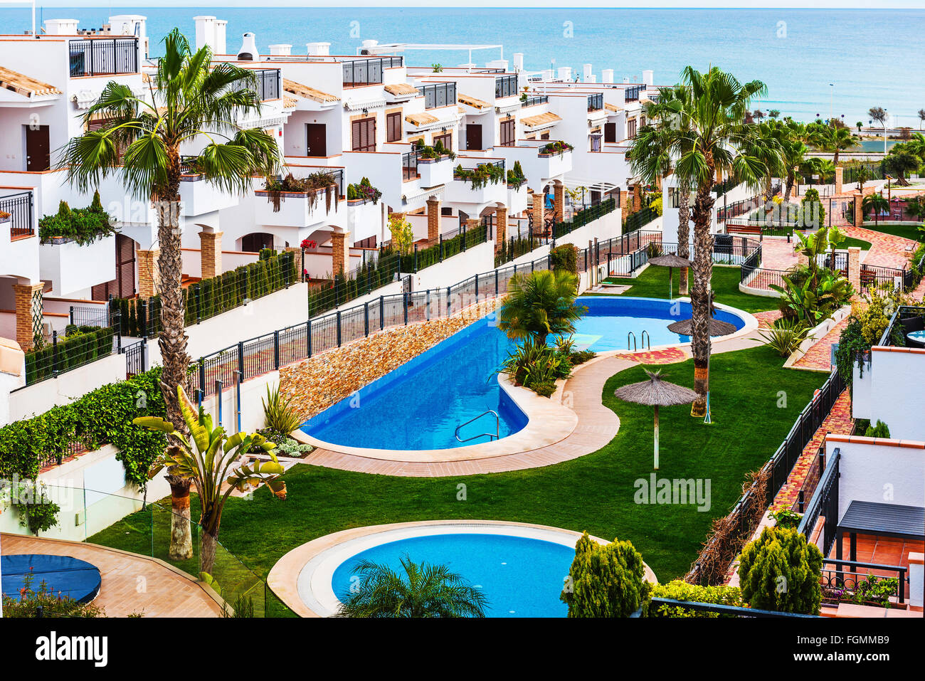 Typical spanish townhouse with a swimming pool near the sea Stock Photo ...