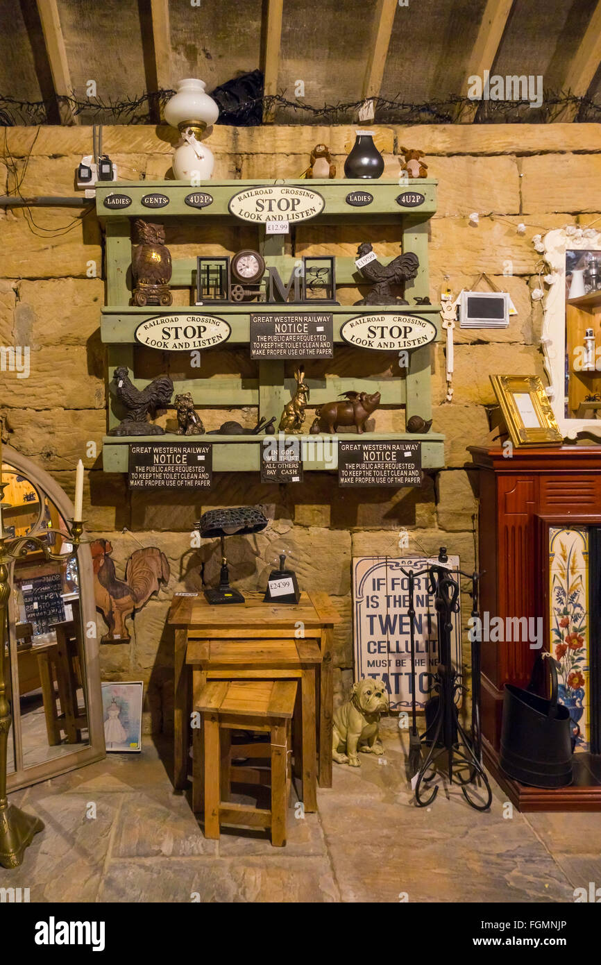 A corner of a Garden Centre with a collection of replica signs and ...