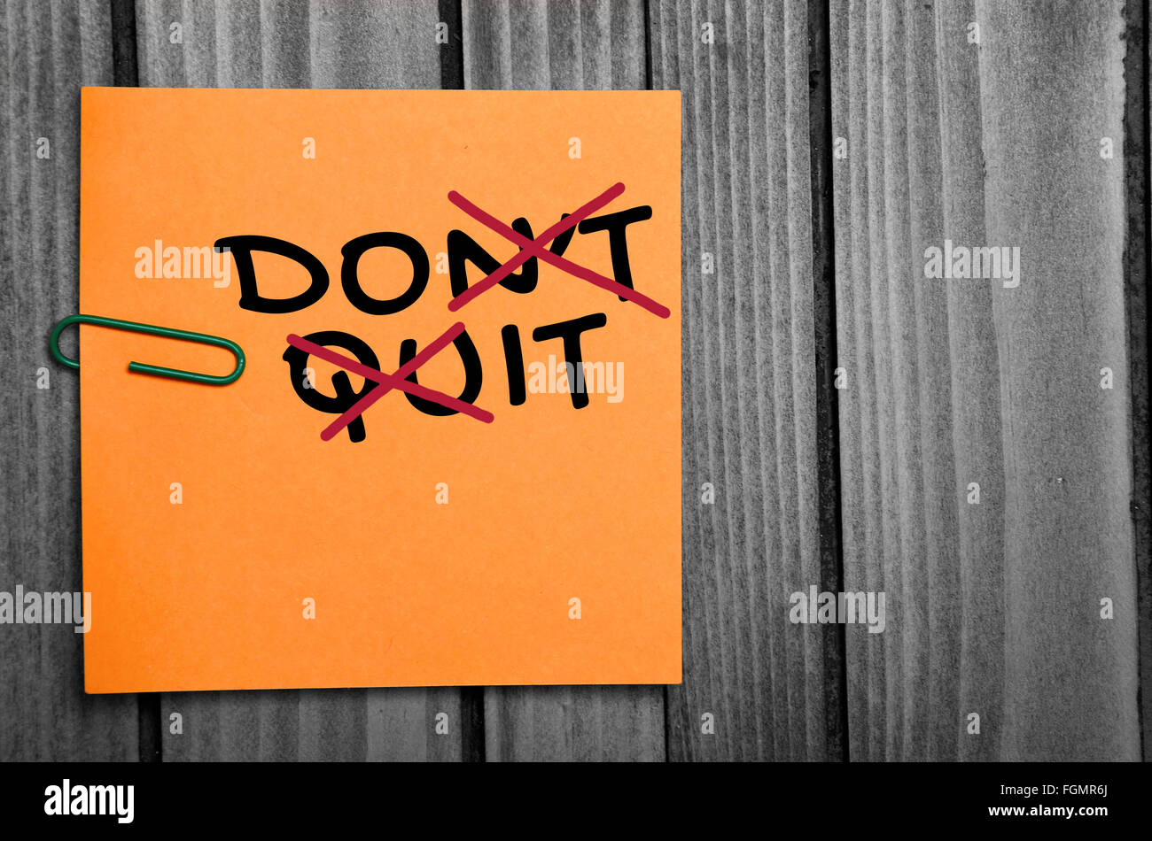 Don't quit words on notes Stock Photo - Alamy