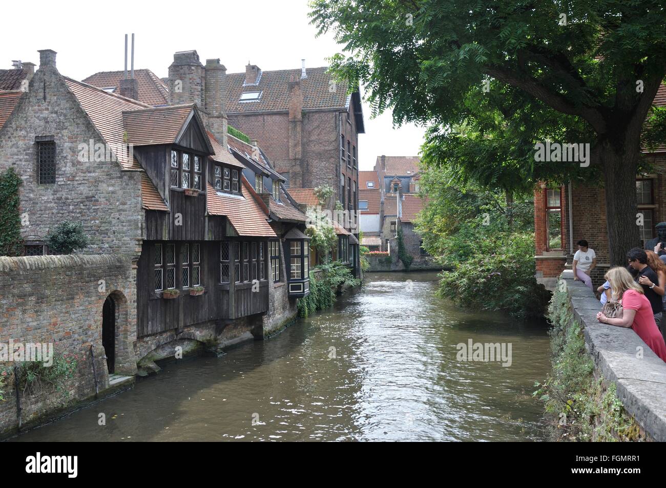 View of canal and old buildings, Bruges, Belgium Stock Photo - Alamy