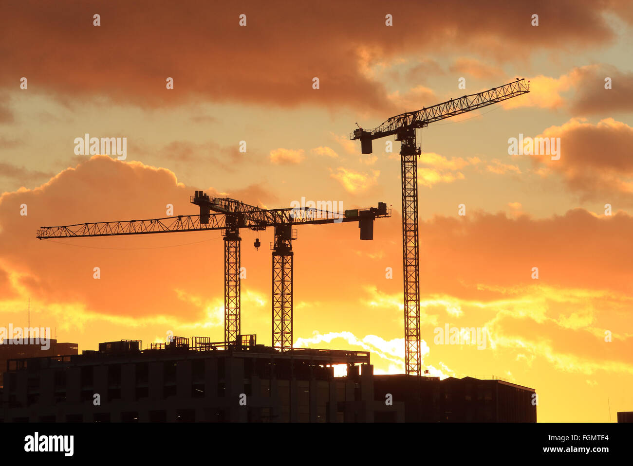 Sunset over construction in KIngs Cross, north London, England, UK ...