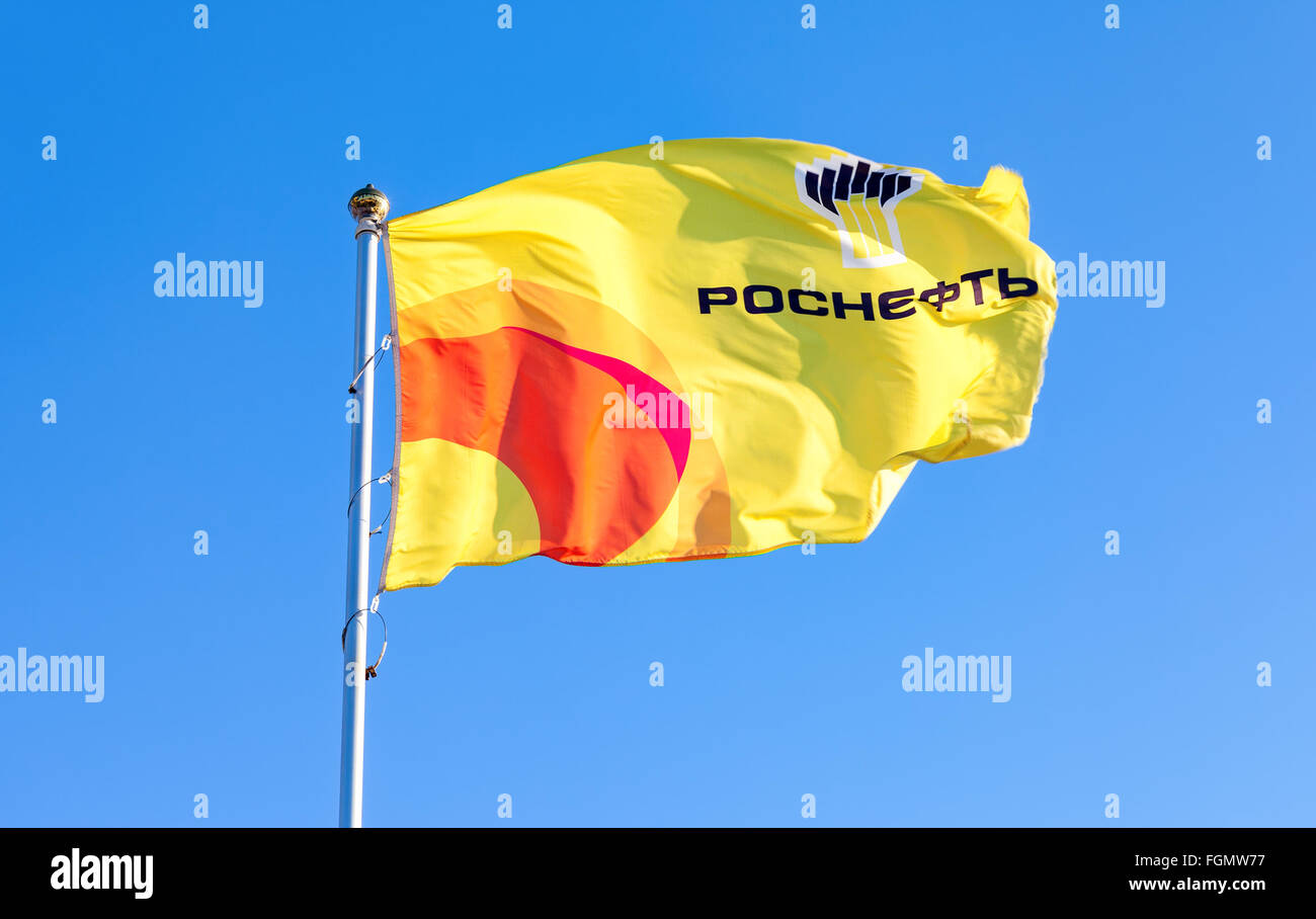 The flag of oil company Rosneft against blue sky Stock Photo - Alamy