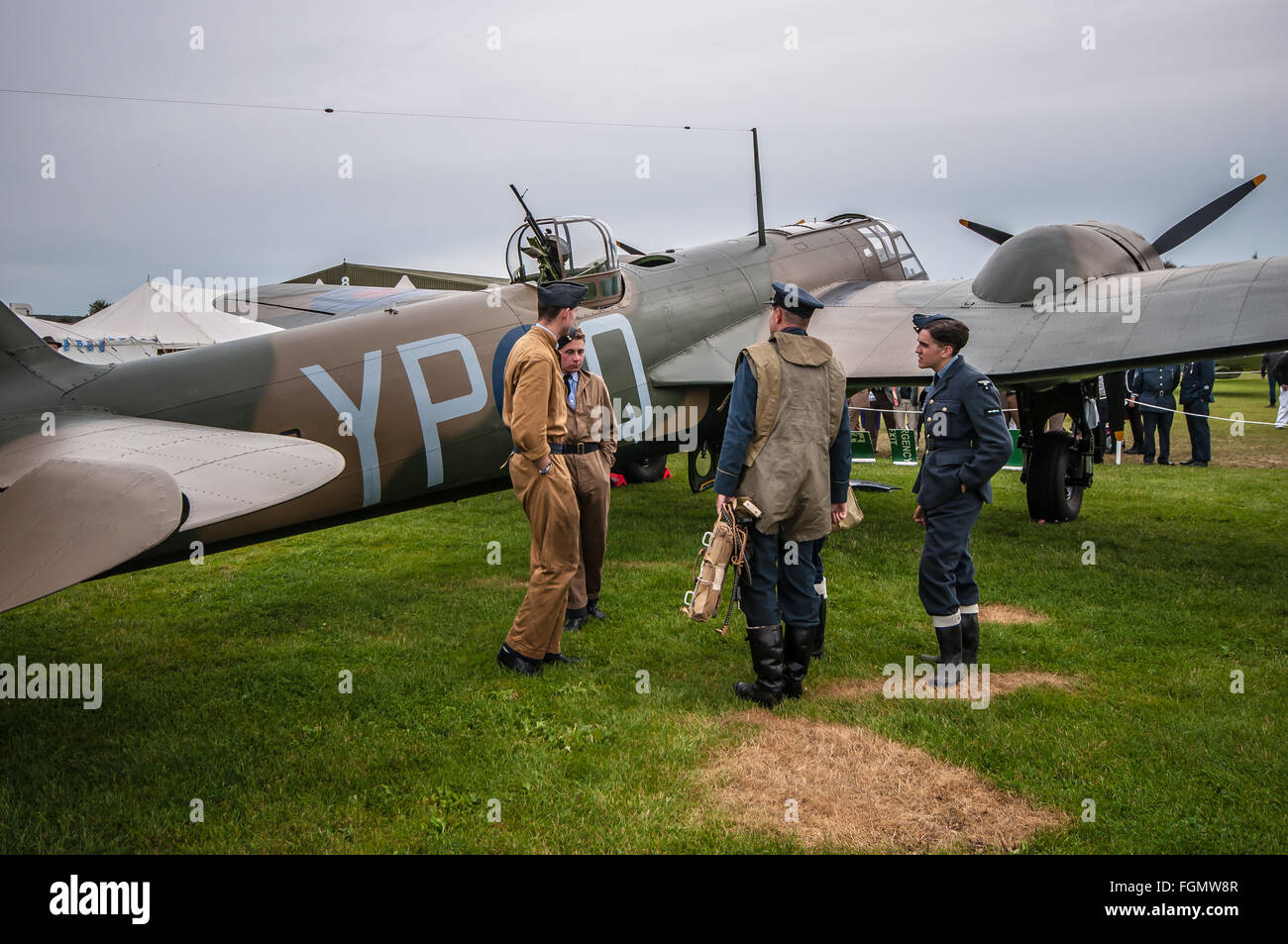 RAF re-enactors stand with a restored Bristol Blenheim MkI bomber at ...