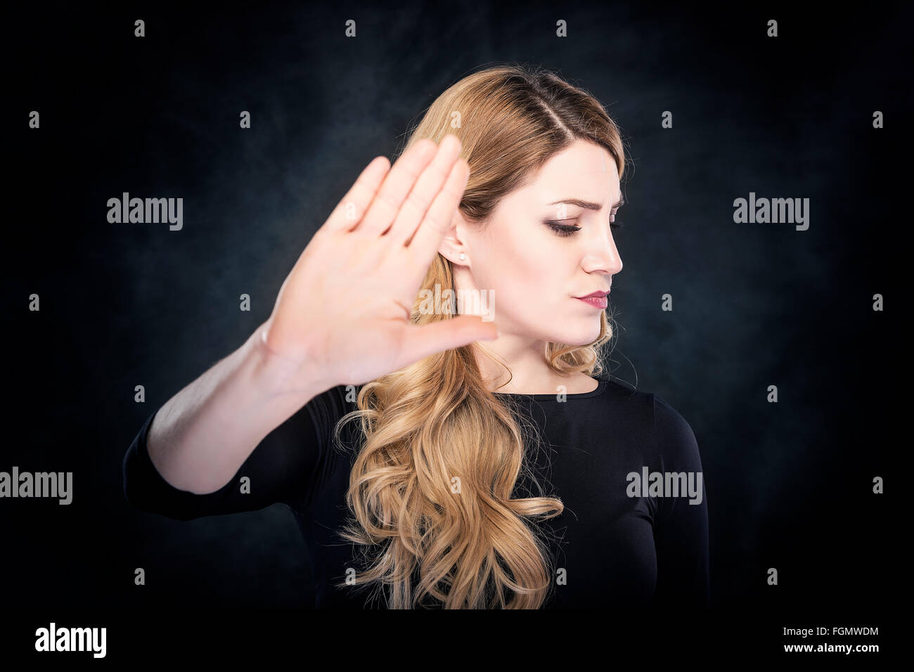 Girl shows stop sign Stock Photo - Alamy