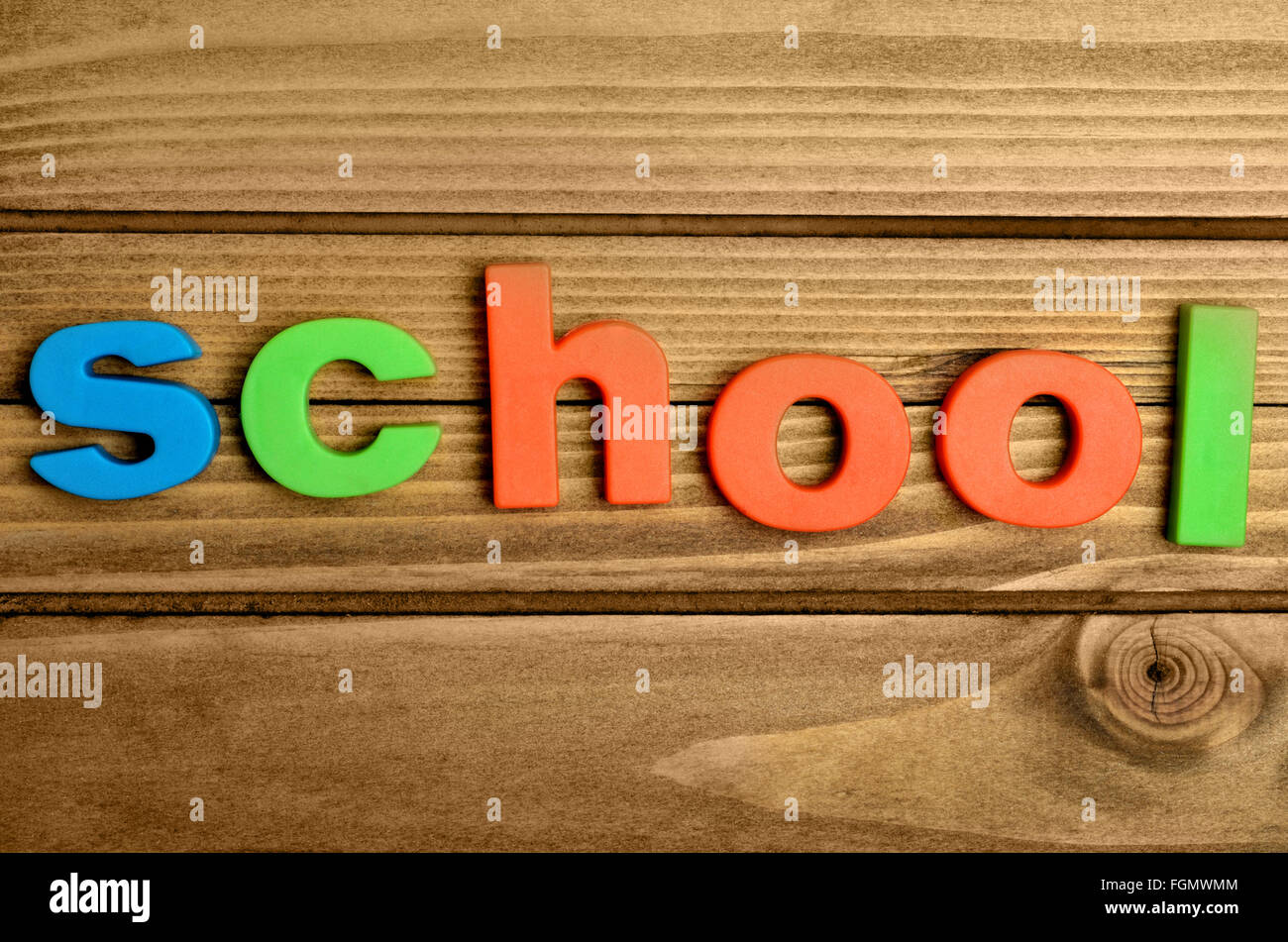 School word on wooden table Stock Photo - Alamy