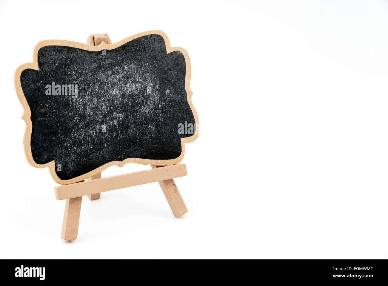 Wooden easel mini blackboard with faded chalk surface, left hand side ...