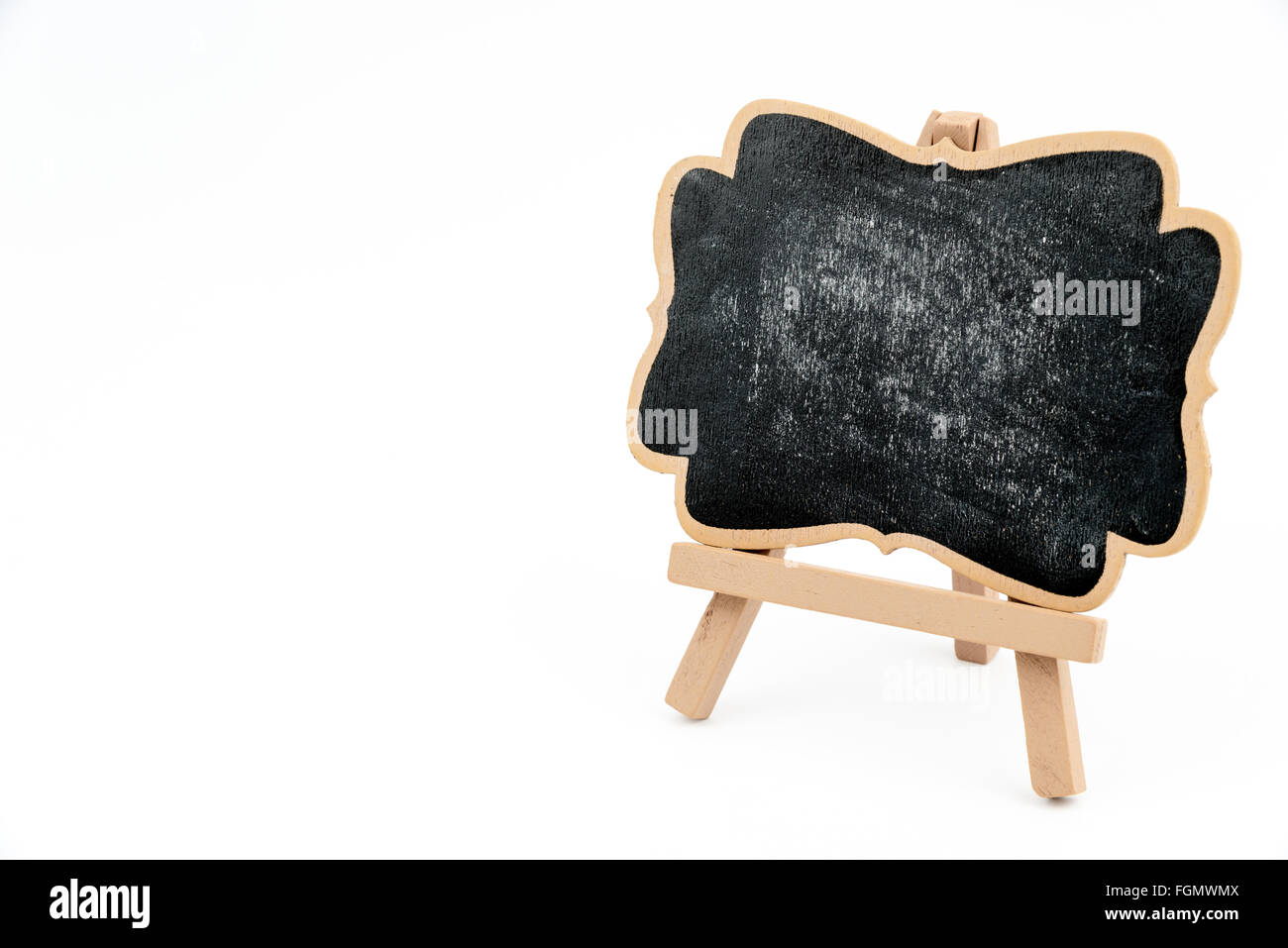 Wooden easel mini blackboard with faded chalk surface, right hand side ...