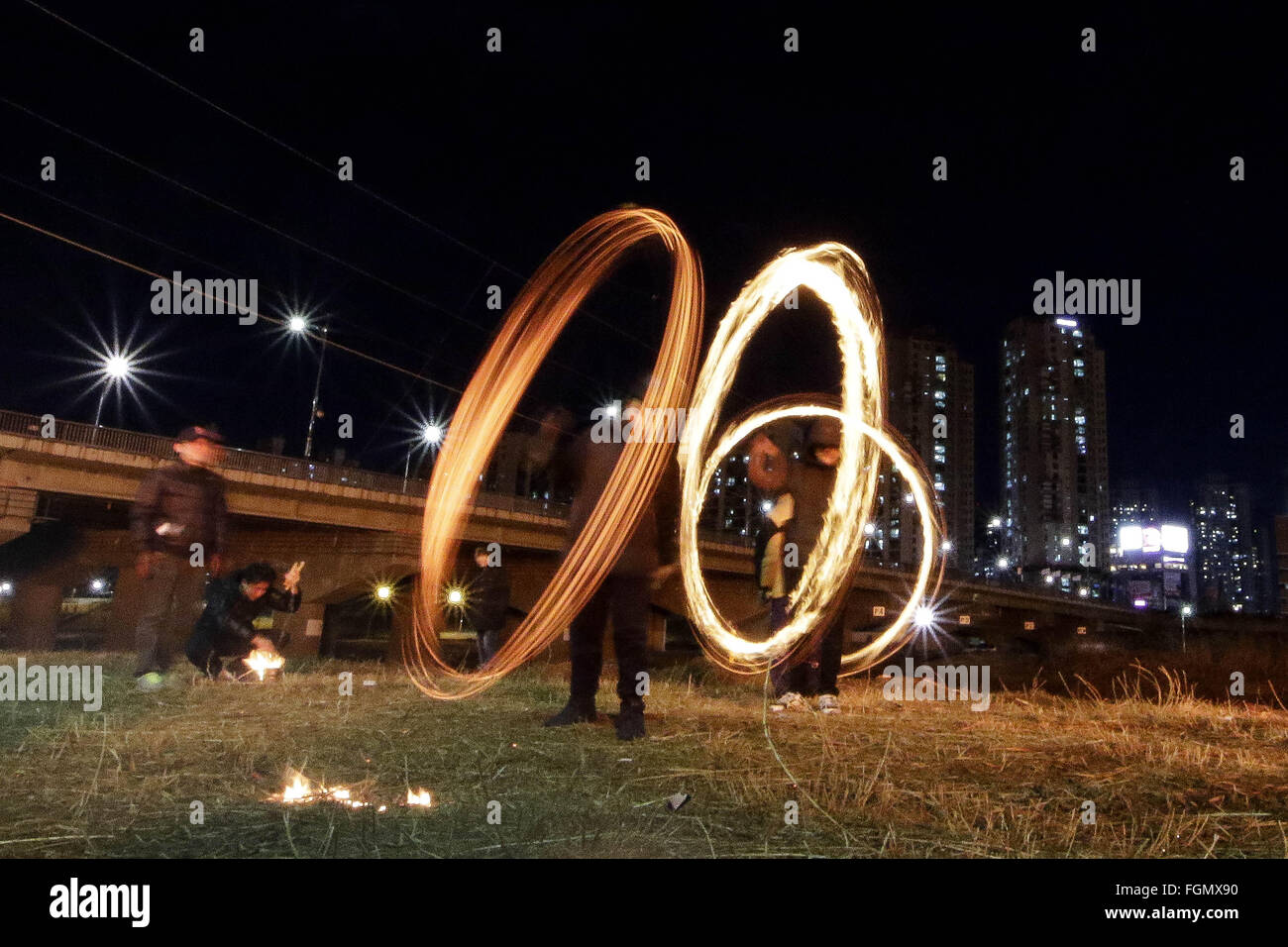 Seoul, South Korea. 21st Feb, 2016. Participants display fireball on ...