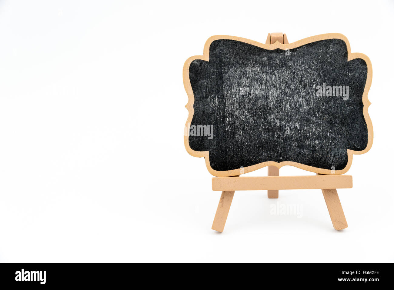 Wooden easel mini blackboard with faded chalk surface, right hand side ...