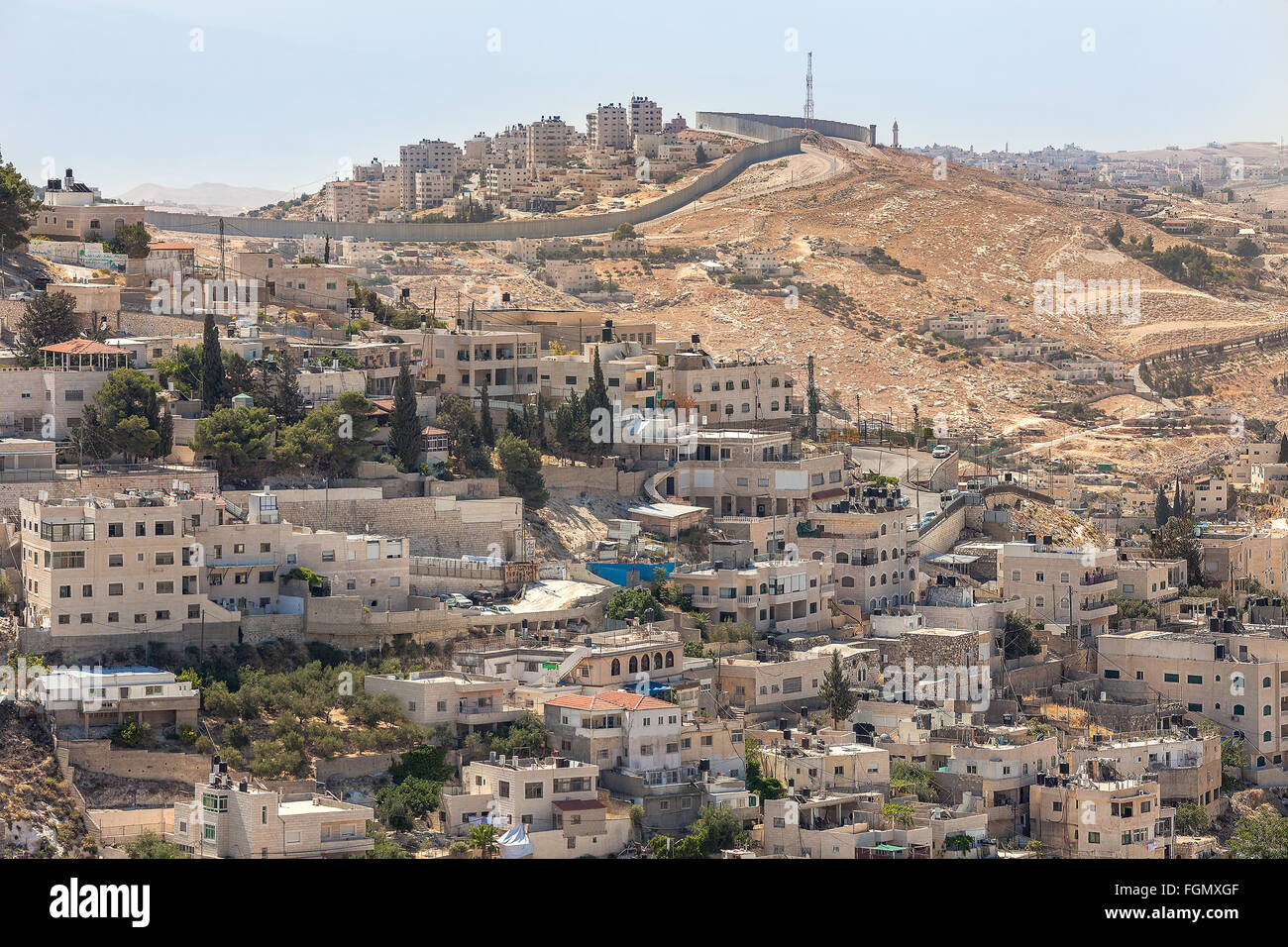 Silwan neighborhood and separation wall on background in Israel Stock ...