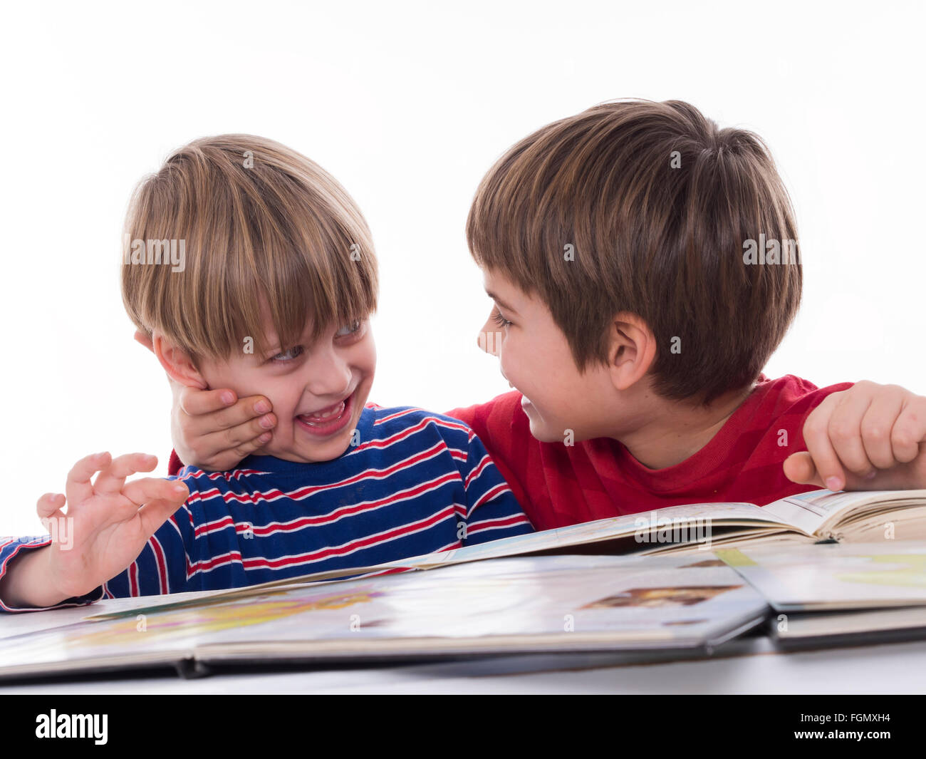 Child learning to read with man hi-res stock photography and images - Alamy