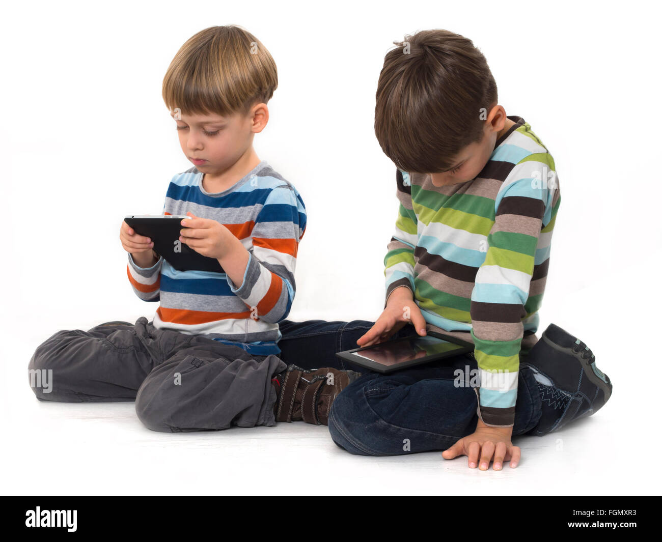 Boys playing video games Cut Out Stock Images & Pictures - Alamy