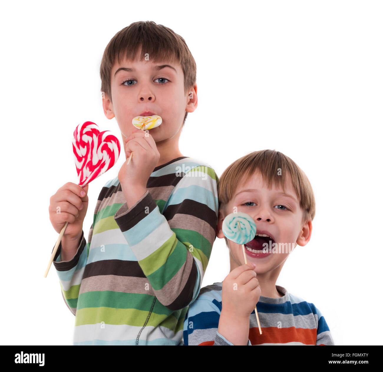 happy boys with lollipops Stock Photo - Alamy