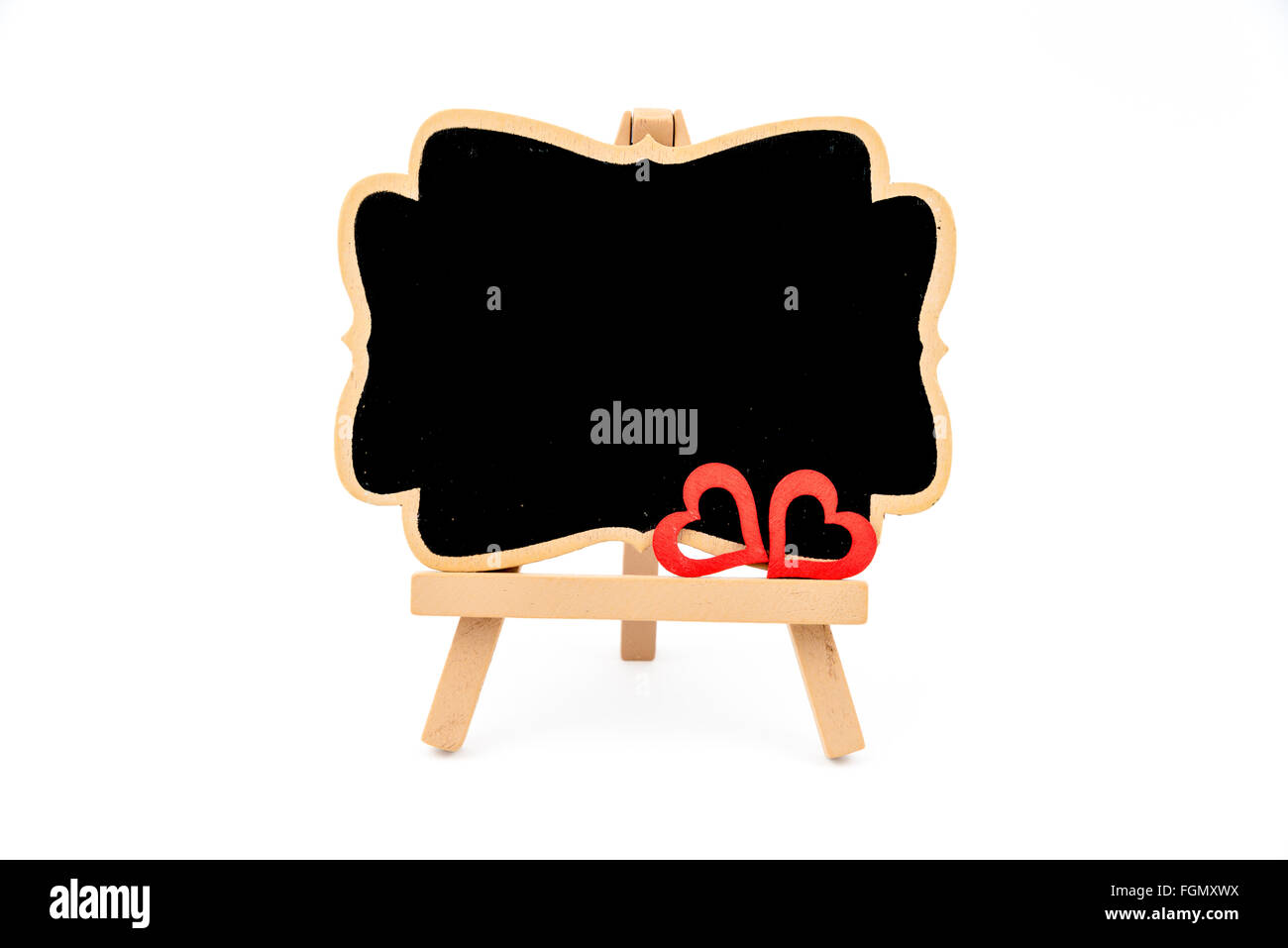 Wooden easel mini blackboard with faded chalk surface, empty space for ...
