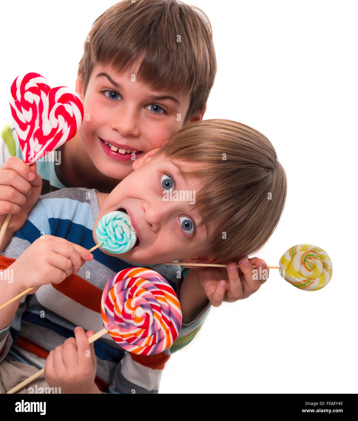 happy boys with lollipops Stock Photo - Alamy