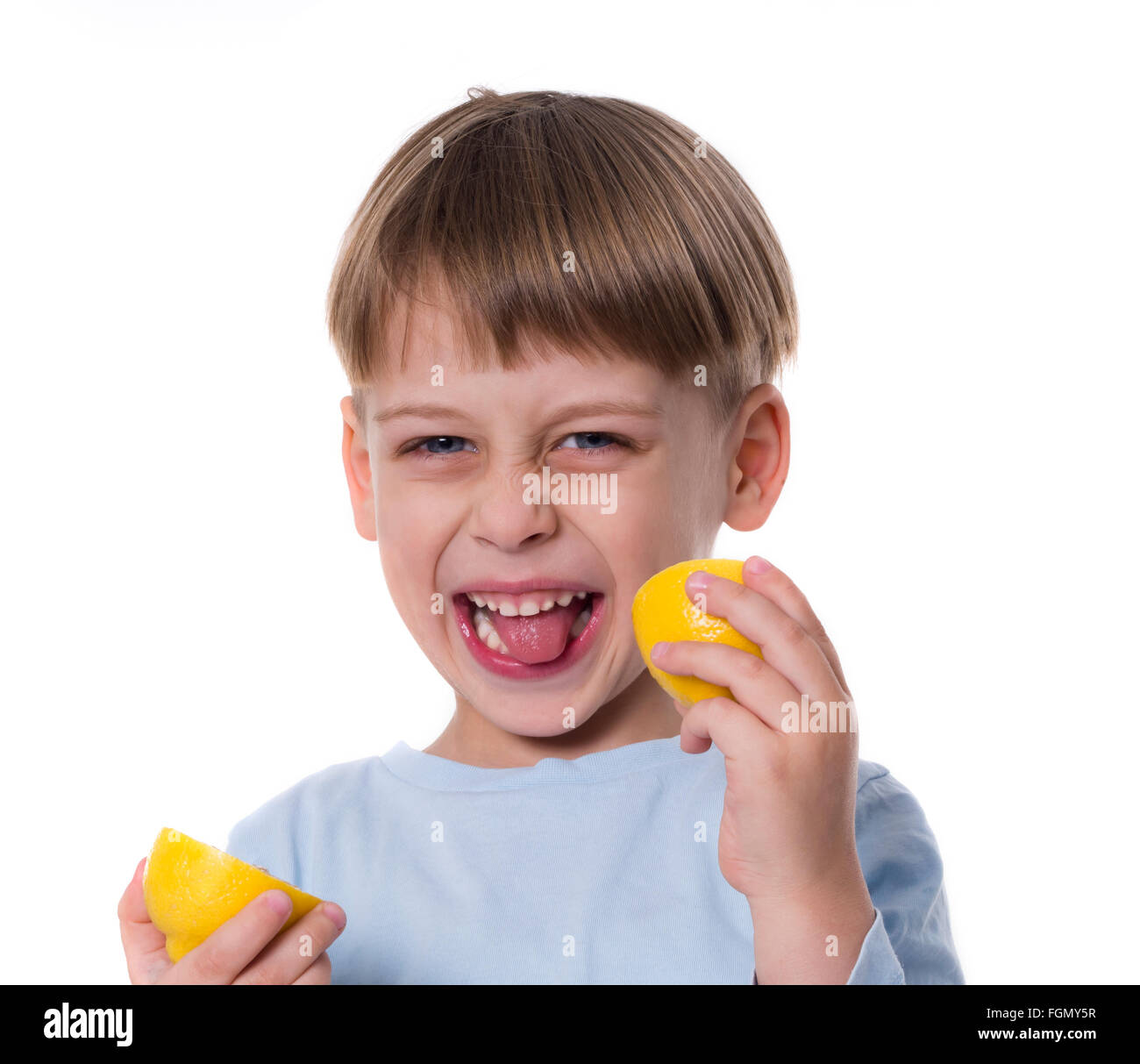 boy eating lemon Stock Photo - Alamy