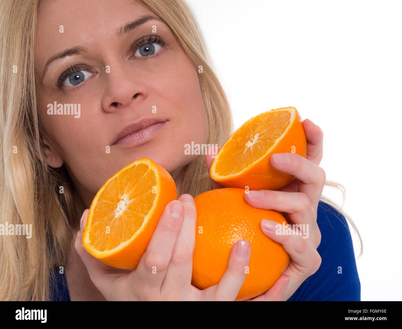woman eating an orange, diet Stock Photo - Alamy