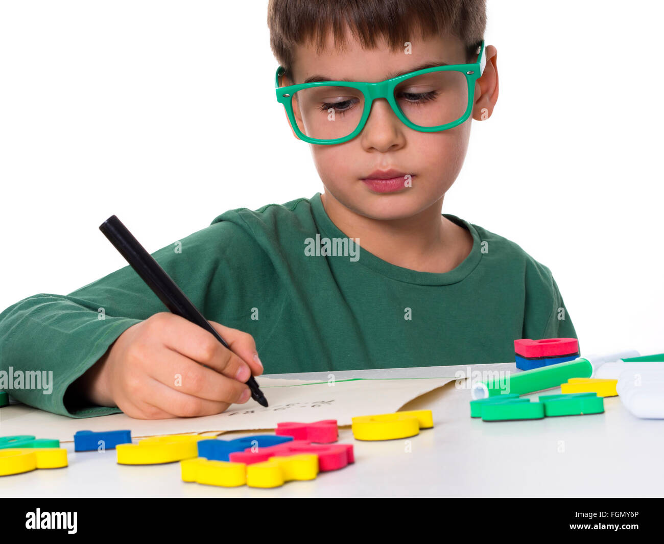 boy writing education concept Stock Photo - Alamy