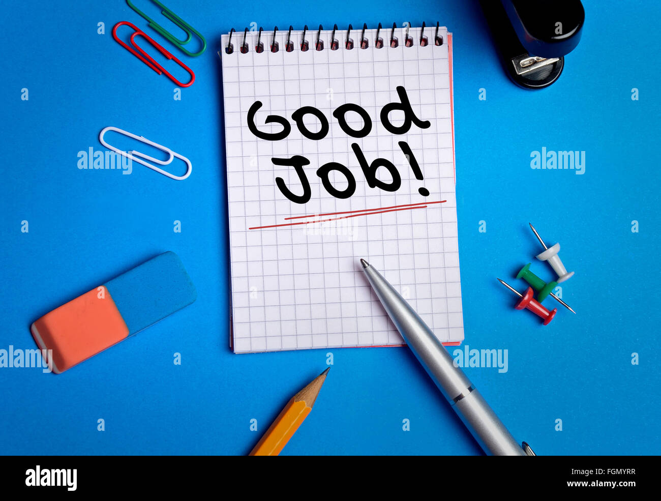 Good job word on notebook page Stock Photo - Alamy