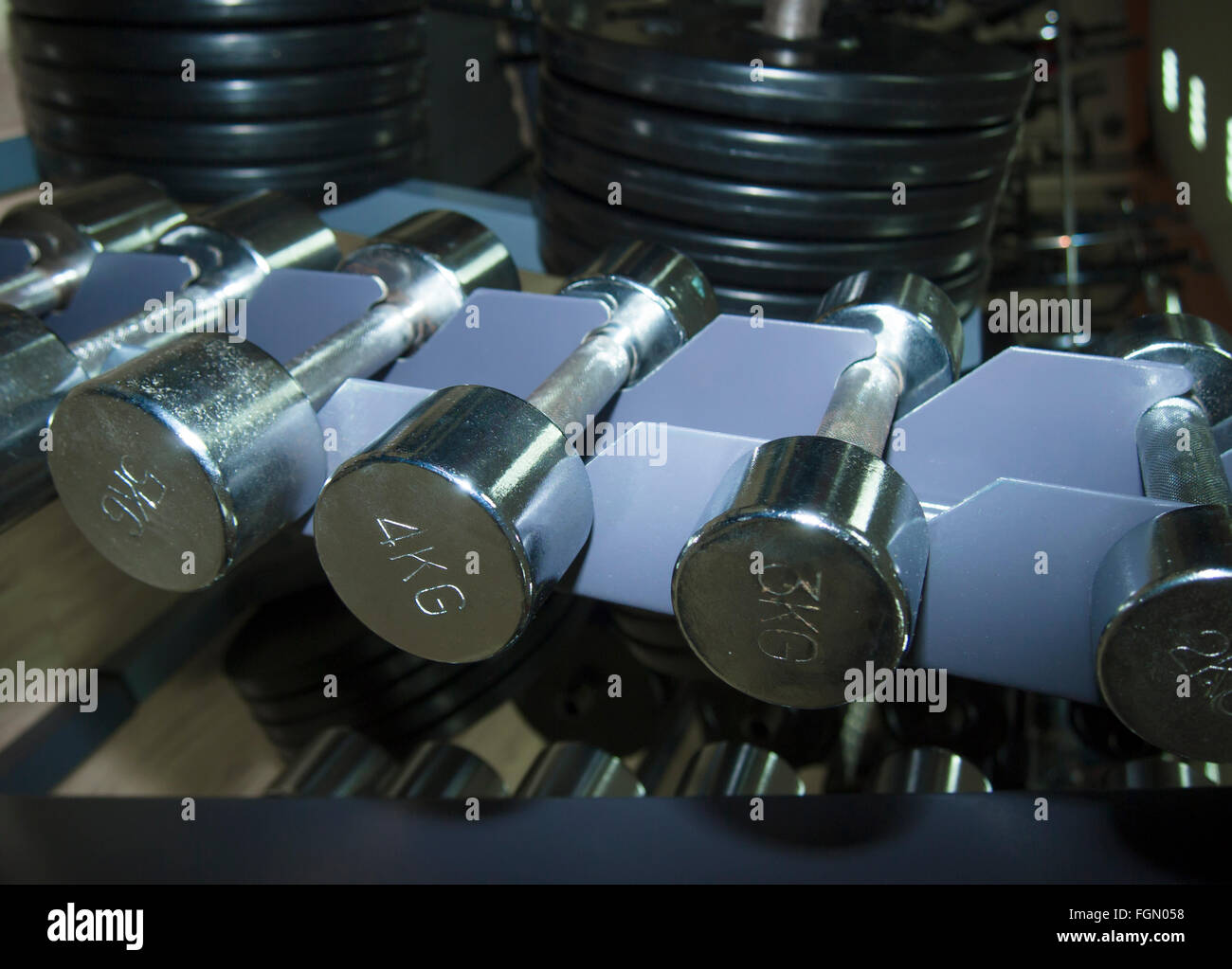 Metal barbells hi-res stock photography and images - Alamy