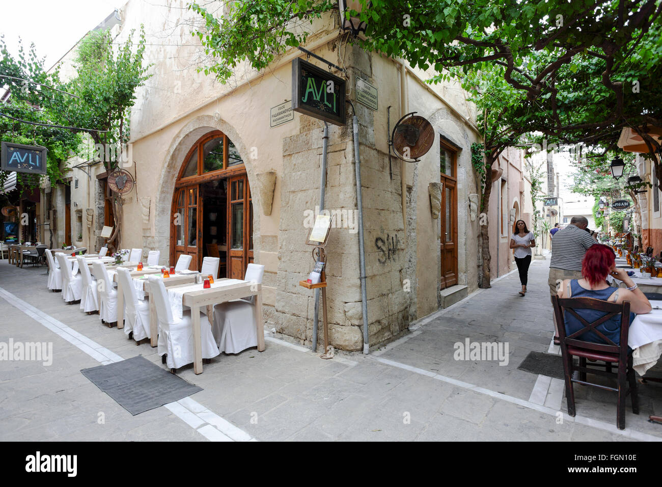 The Avli Hotel and inner courtyard restaurant displays traditional ...