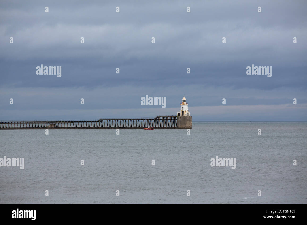 The lighthouse on the pier at Blyth in Northumberland, England. The ...