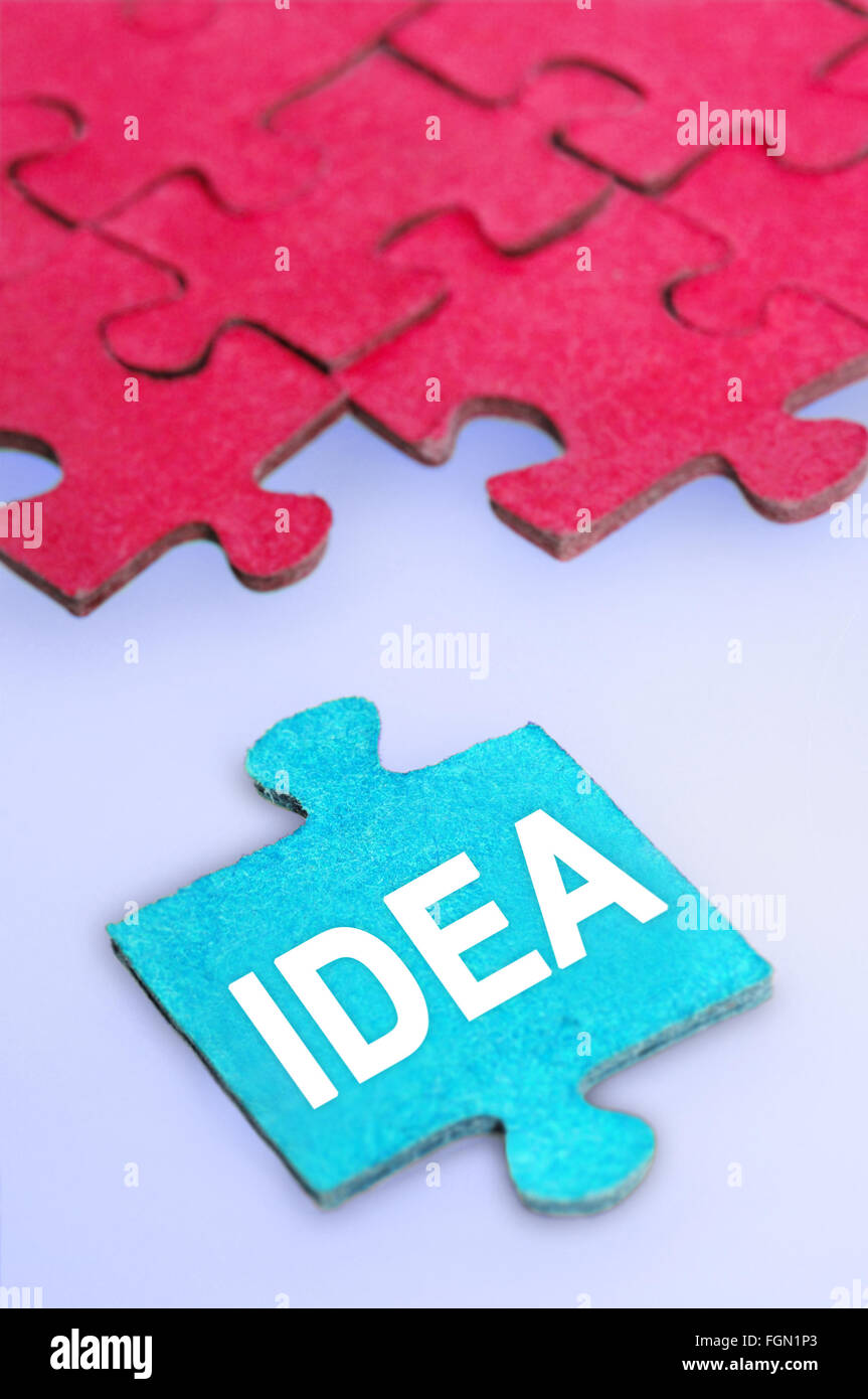 Puzzle with Idea word piece Stock Photo - Alamy