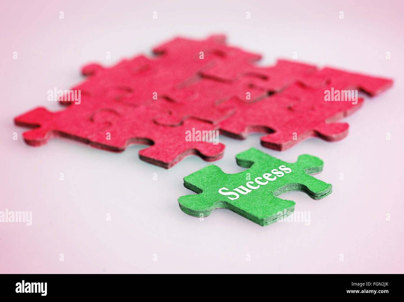 Puzzle with Success word piece Stock Photo - Alamy