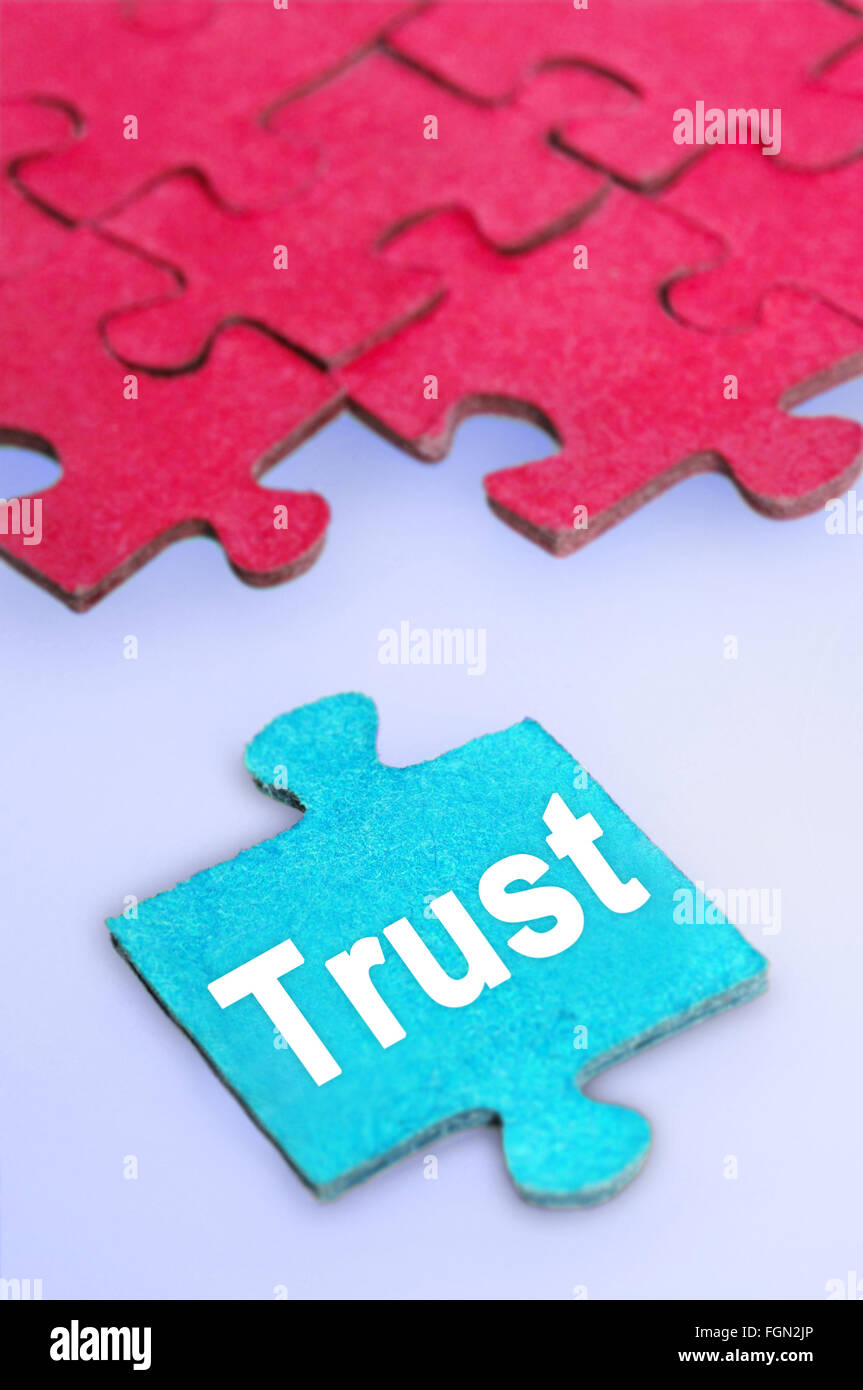 Puzzle with Trust word piece Stock Photo - Alamy