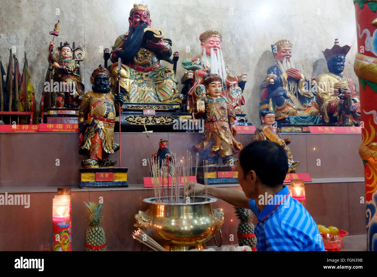 Pekanbaru, Indonesia. 21st Feb, 2016. Member of the temple doing prayer ...