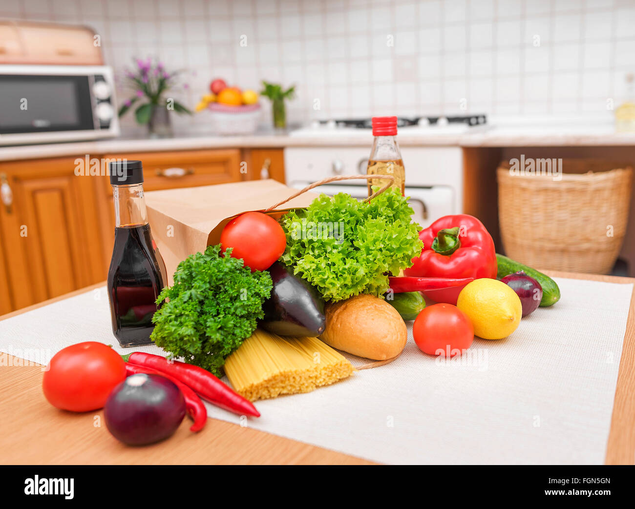 Paper bag with food in the kitchen Stock Photo - Alamy