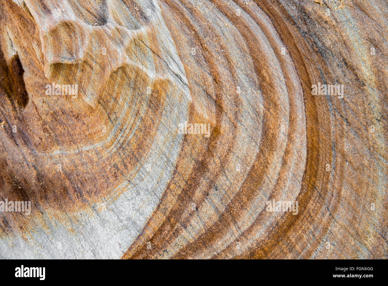 Australian rock formation background, sandstone texture with iron ...