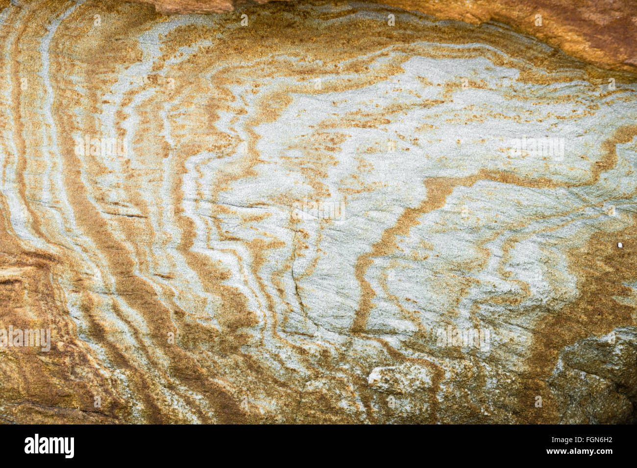Australian rock formation background, sandstone texture with iron ...
