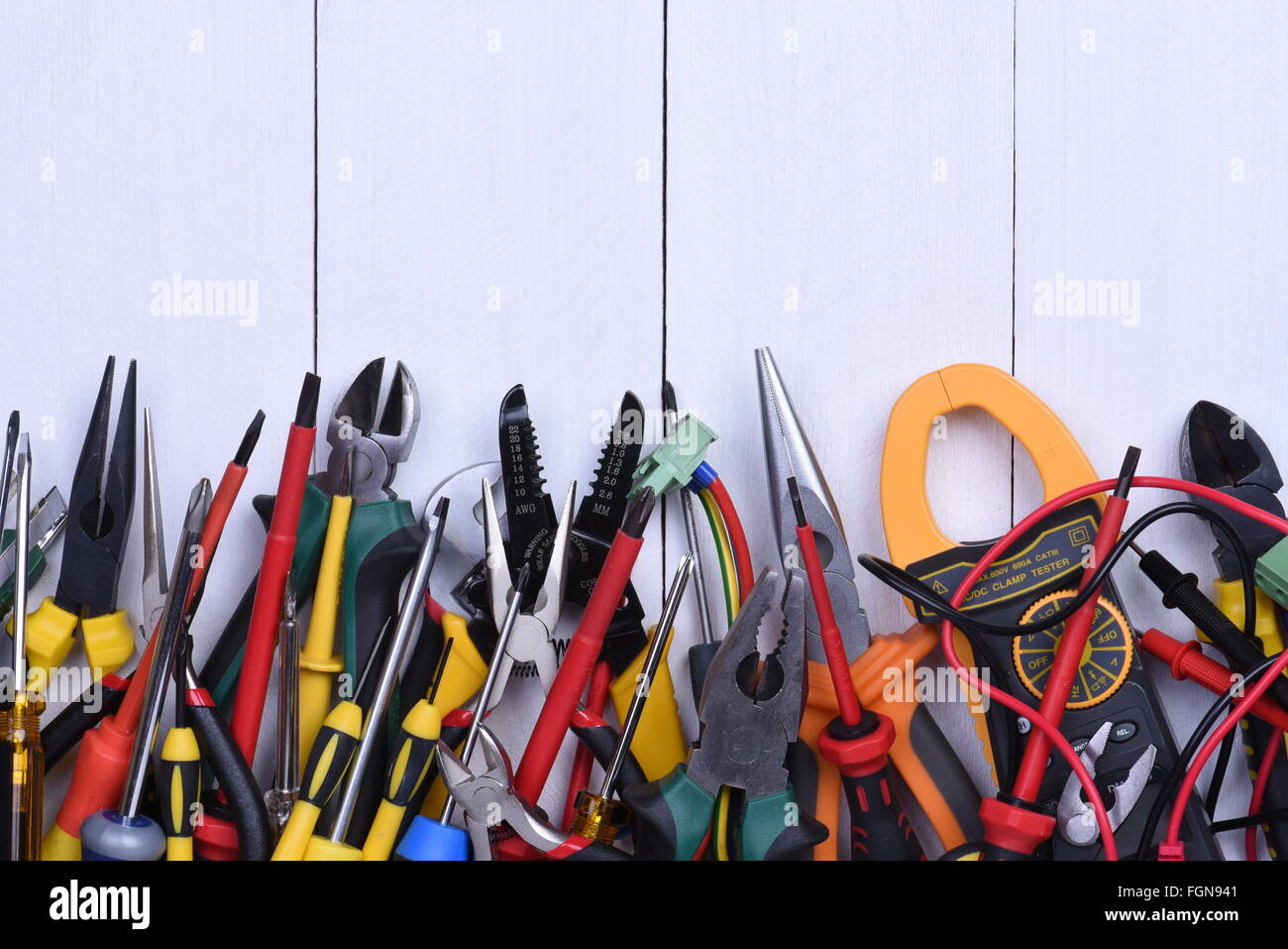 Tools to use in electrical installations on wooden background Stock ...