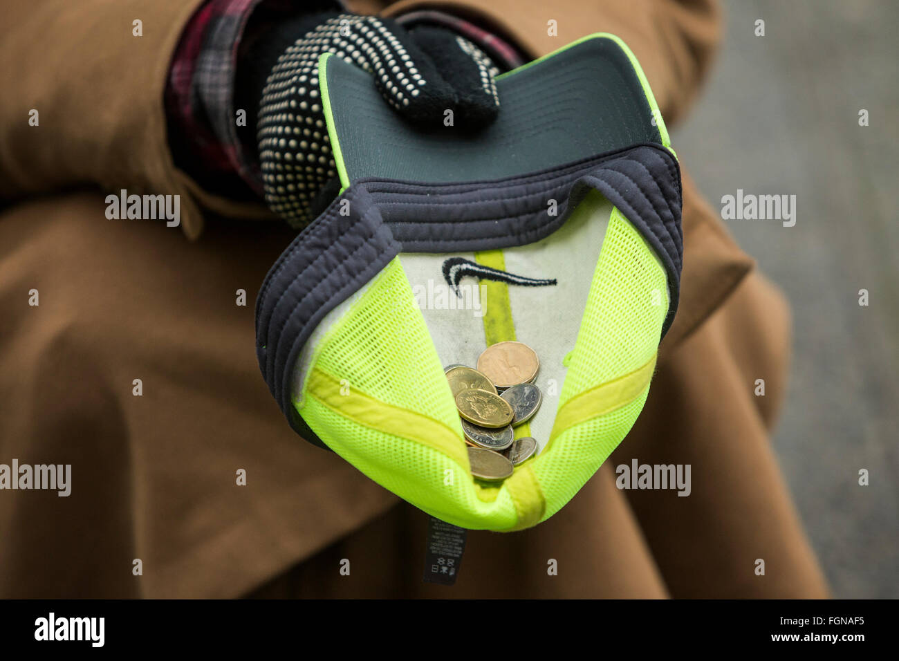Elderly male panhandler on street corner in Chinatown-Victoria, British ...