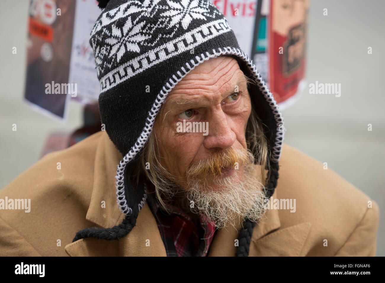 Elderly male panhandler on street corner in Chinatown-Victoria, British ...