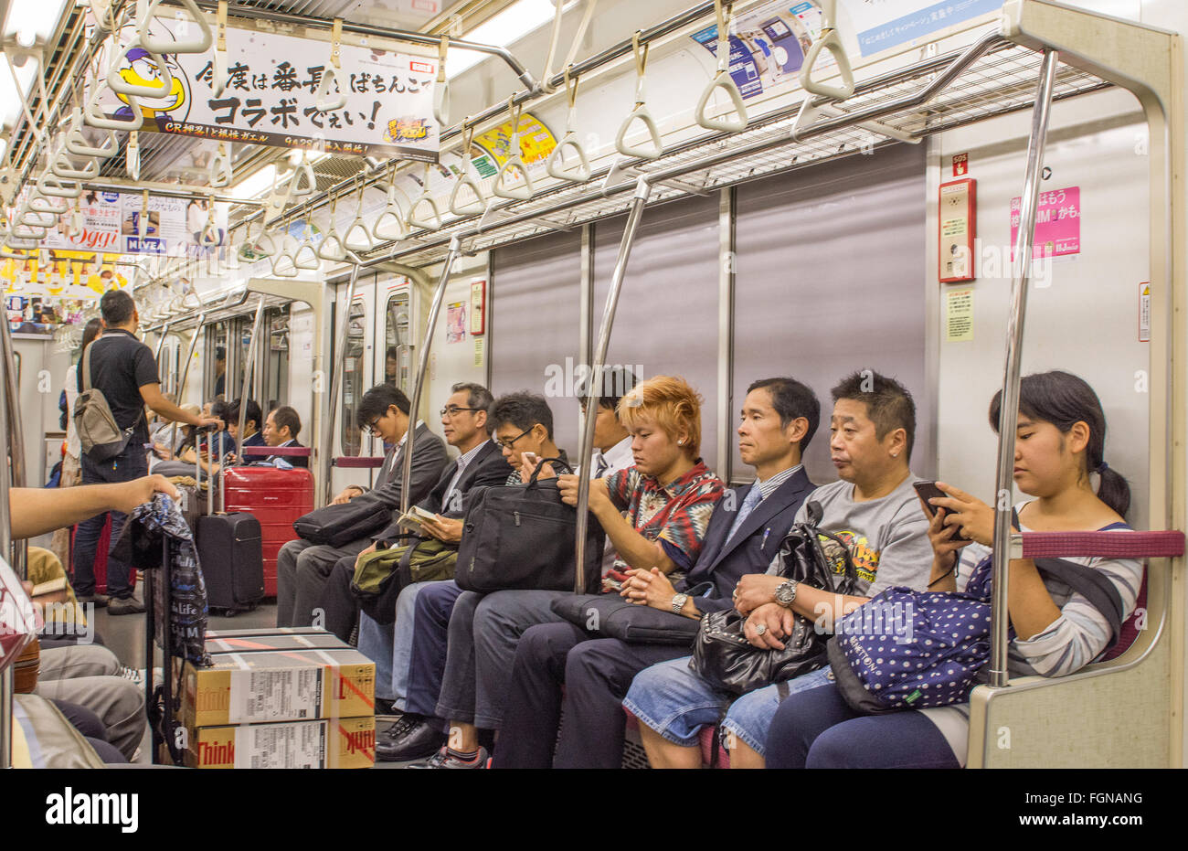 Tokyo Japan crowds subway car with locals going to work in crowded ...