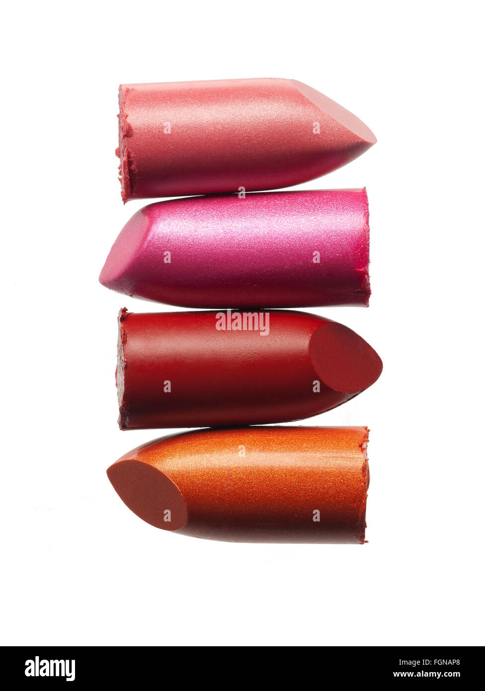 A group of four lipsticks on a white background Stock Photo - Alamy