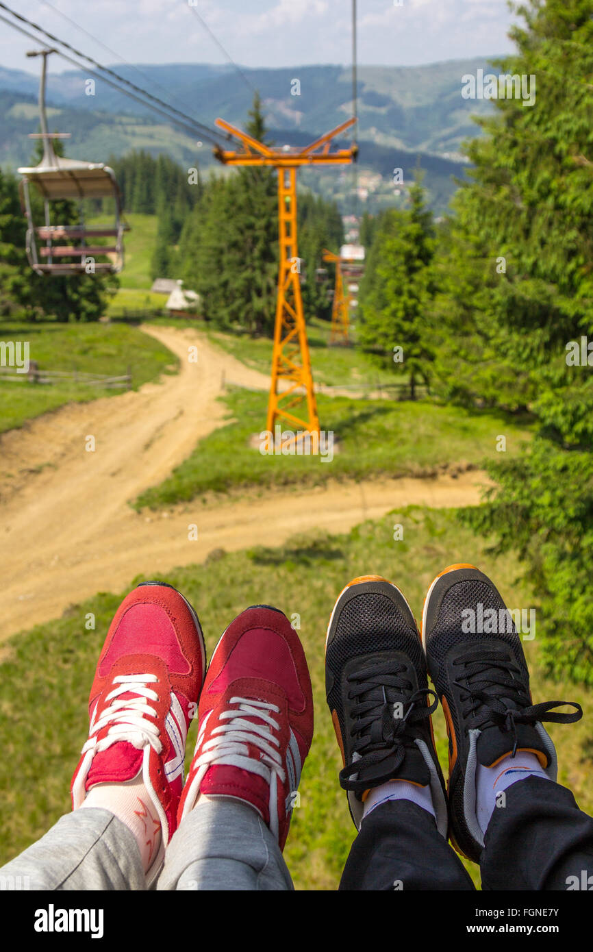 Couple in Chairlift Stock Photo - Alamy