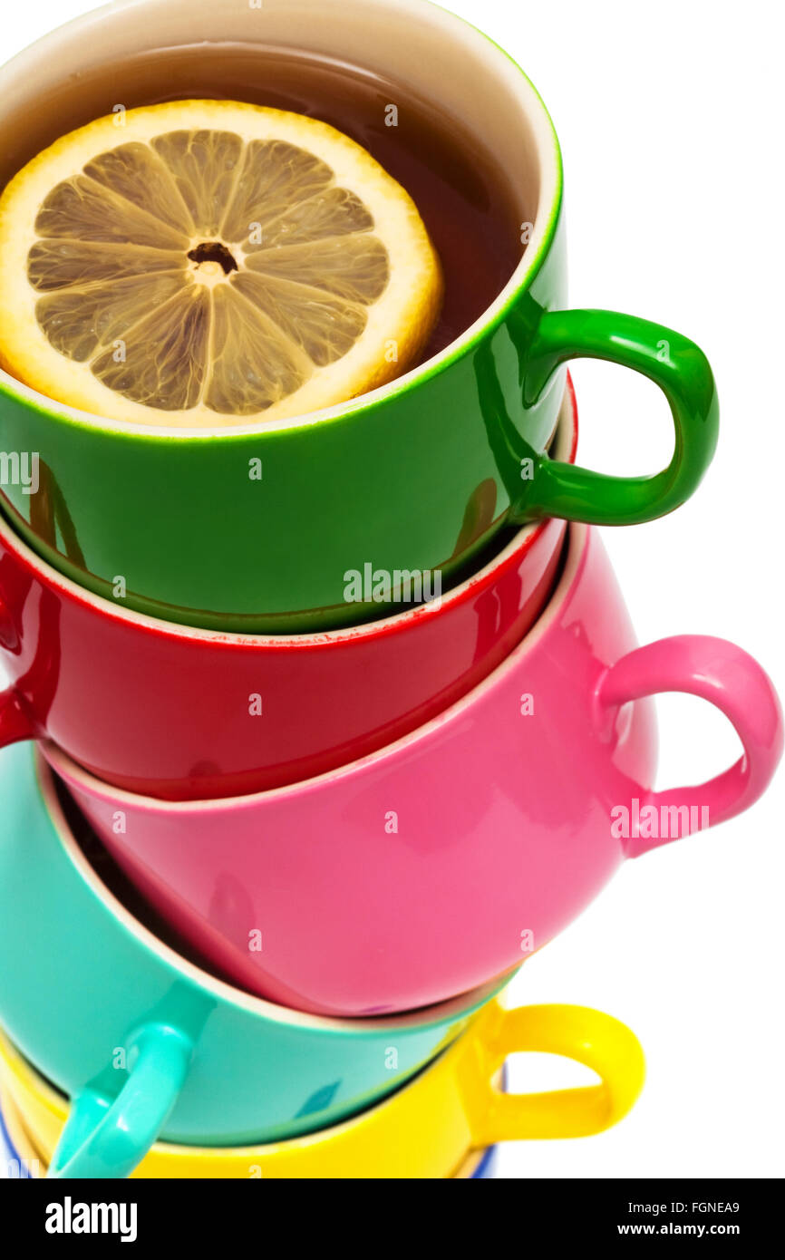 Beautiful color cups on a white background Stock Photo - Alamy