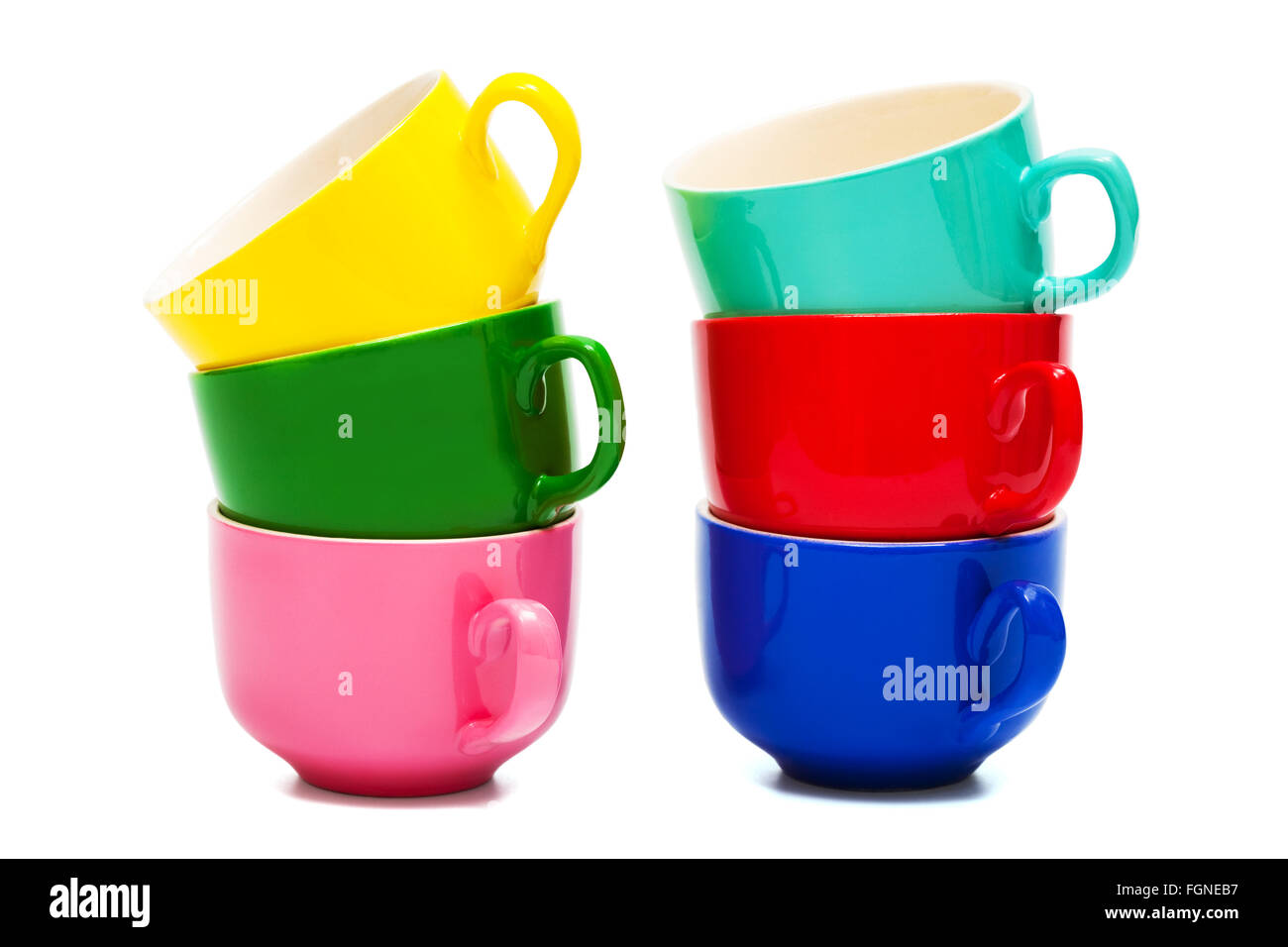 Beautiful color cups on a white background Stock Photo - Alamy