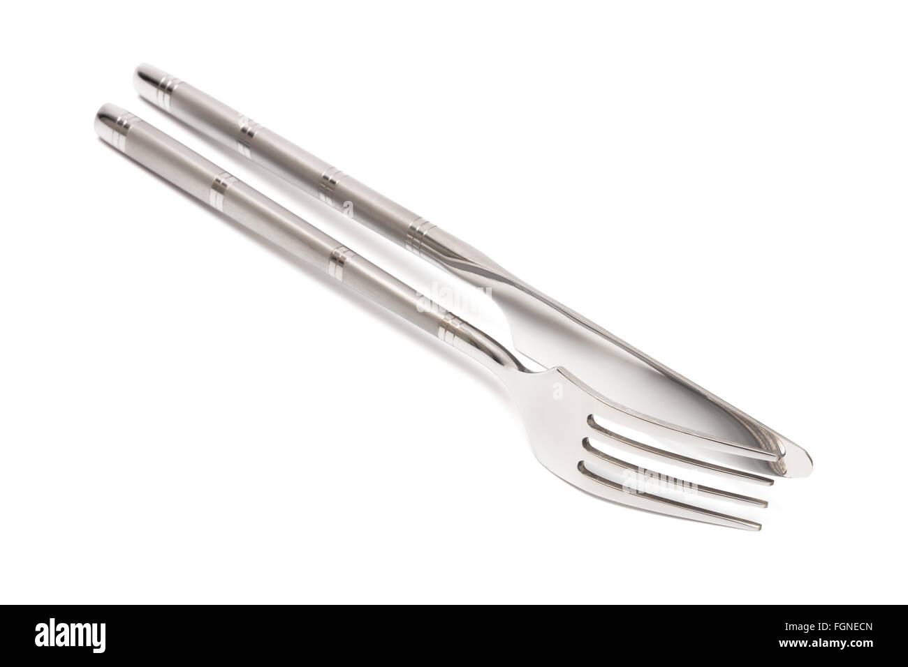 steel knife and fork on a white background Stock Photo - Alamy