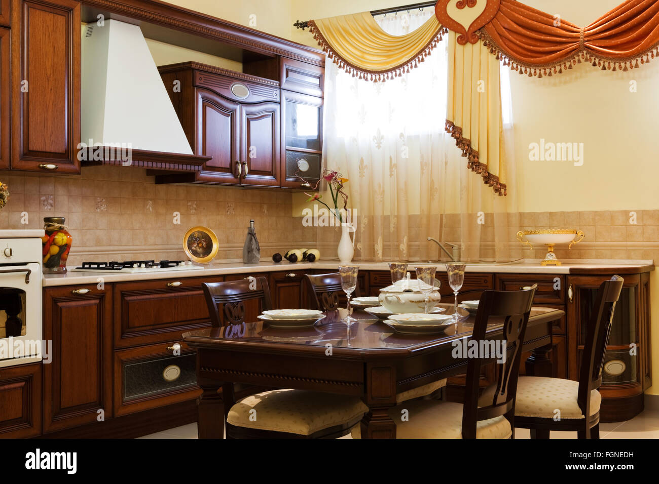 table with the dishes in the modern kitchen Stock Photo - Alamy