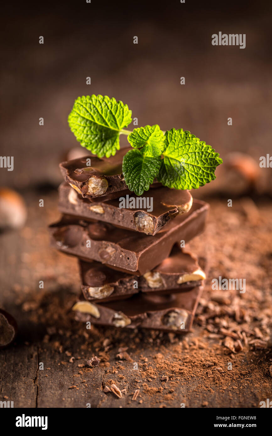 Dark chocolate stack with hazelnut Stock Photo - Alamy