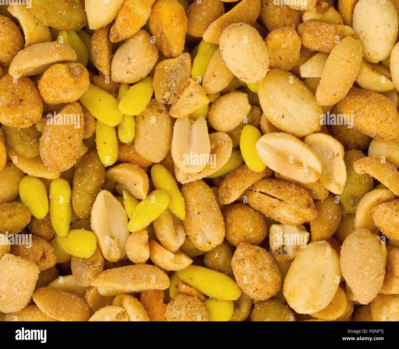 Fresh mixed salted nuts for backgrounds, peanut mix Stock Photo - Alamy