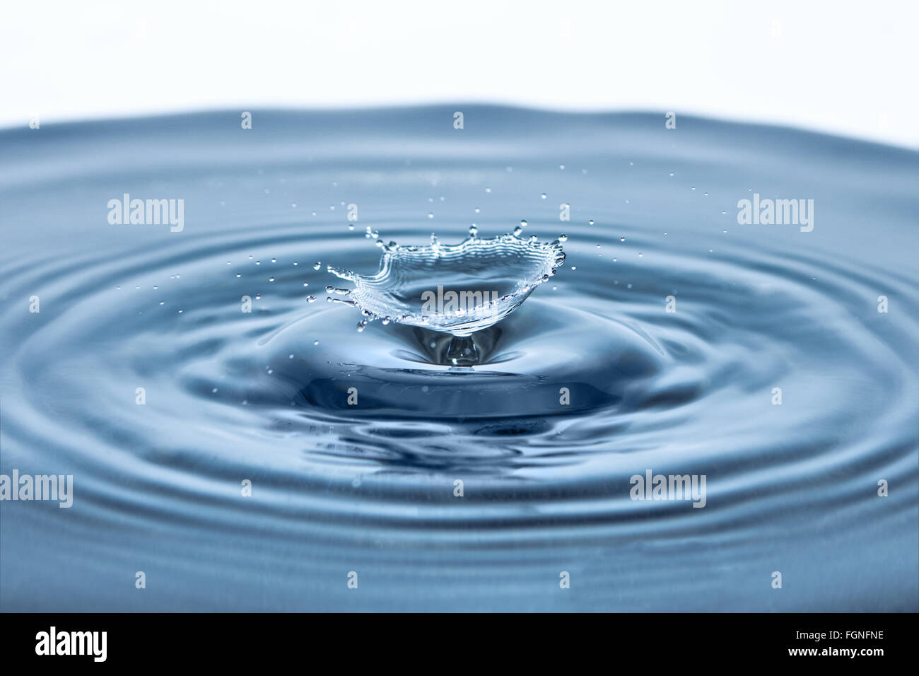 Beautiful splash of Water Drop. Freeze action Stock Photo - Alamy